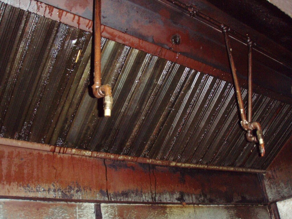 Why is grease accumulation a concern in commercial kitchens? | MSO